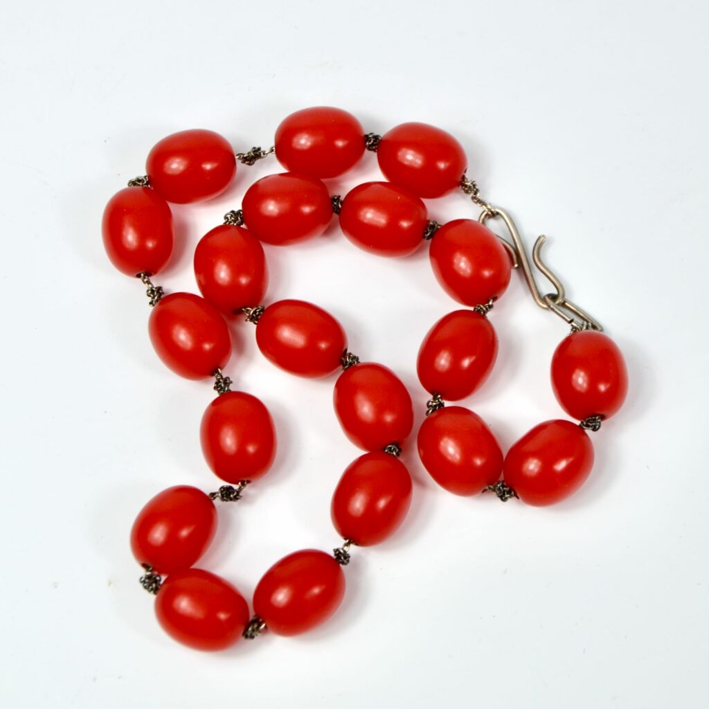 Art Deco red bakelite necklace on hallmarked silver chain | Divine ...